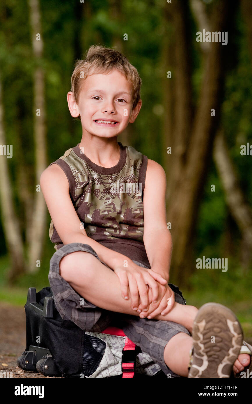 Boy is waiting to travel Stock Photo - Alamy