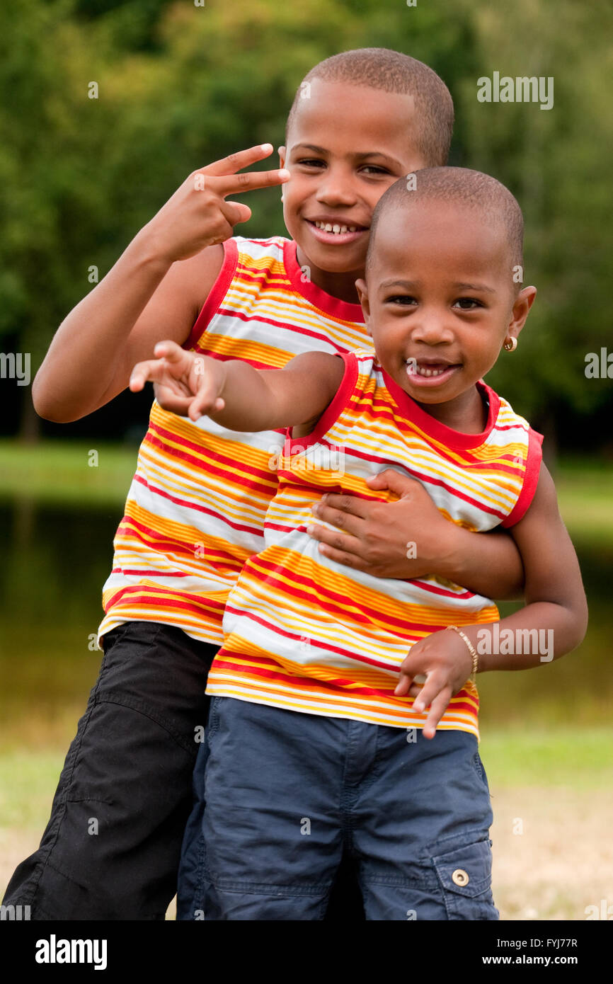 African children ginving peace sign Stock Photo - Alamy