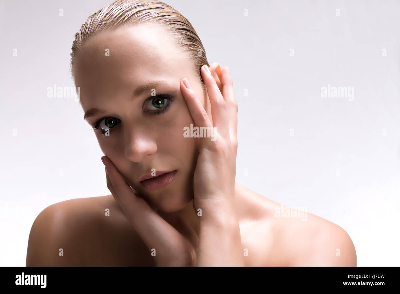 Face holding hi-res stock photography and images - Alamy