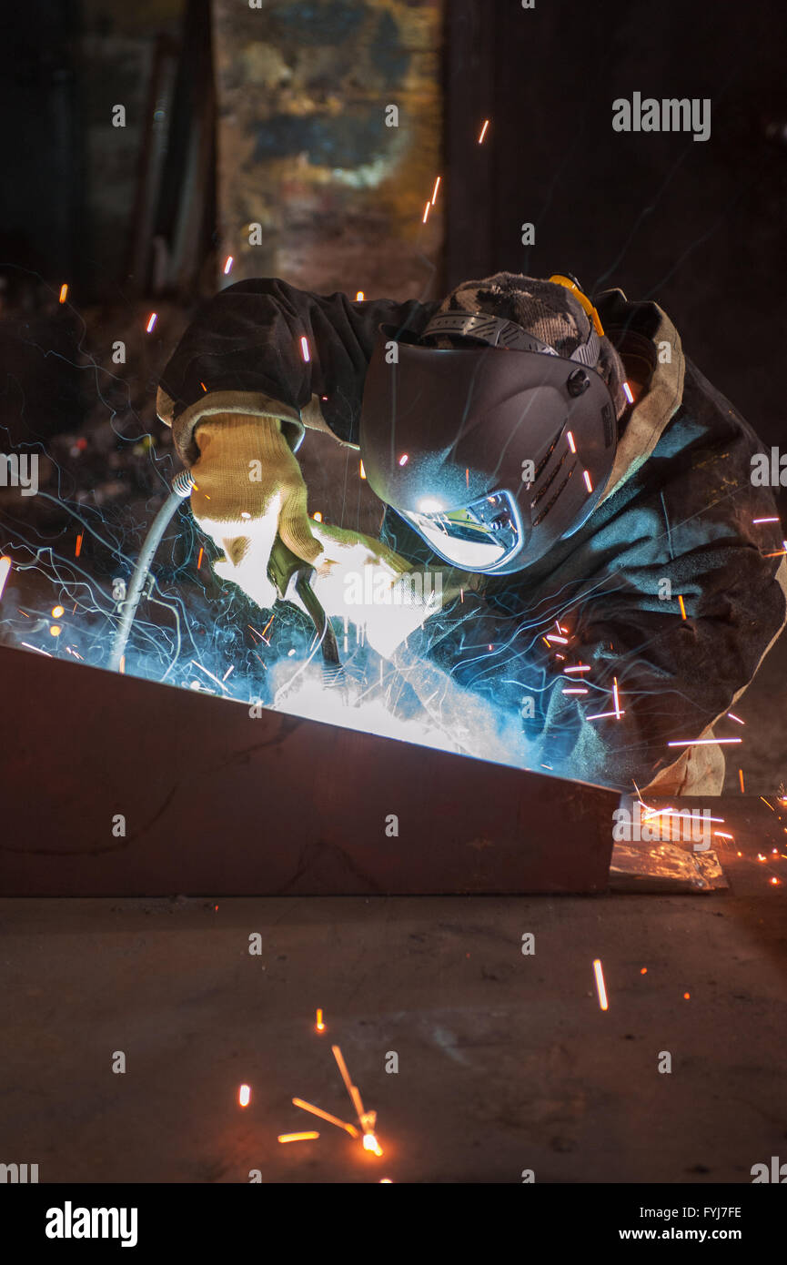 worker welding metal Stock Photo - Alamy