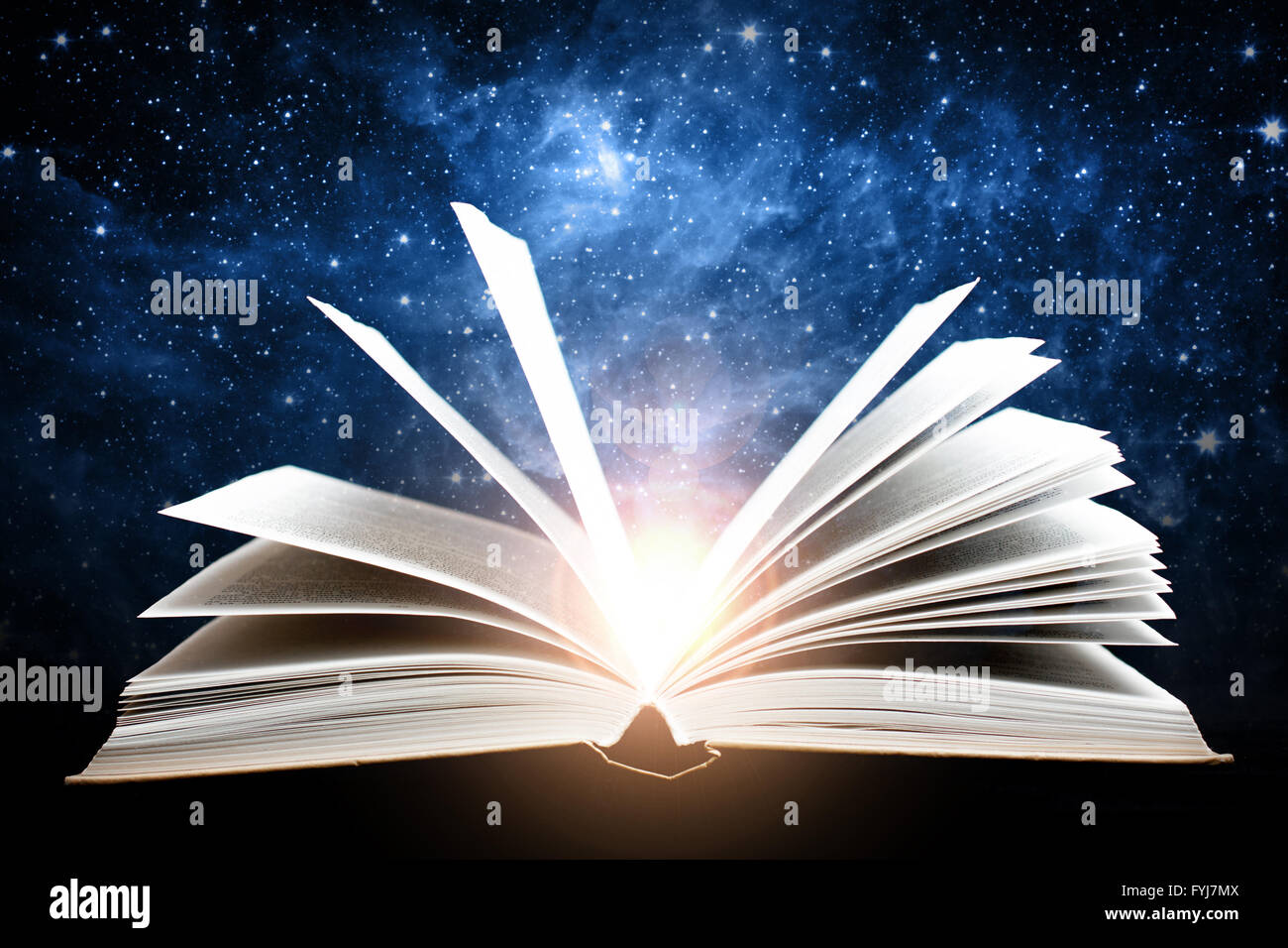 Opened book with galaxy. Elements of this image furnished by NASA Stock ...