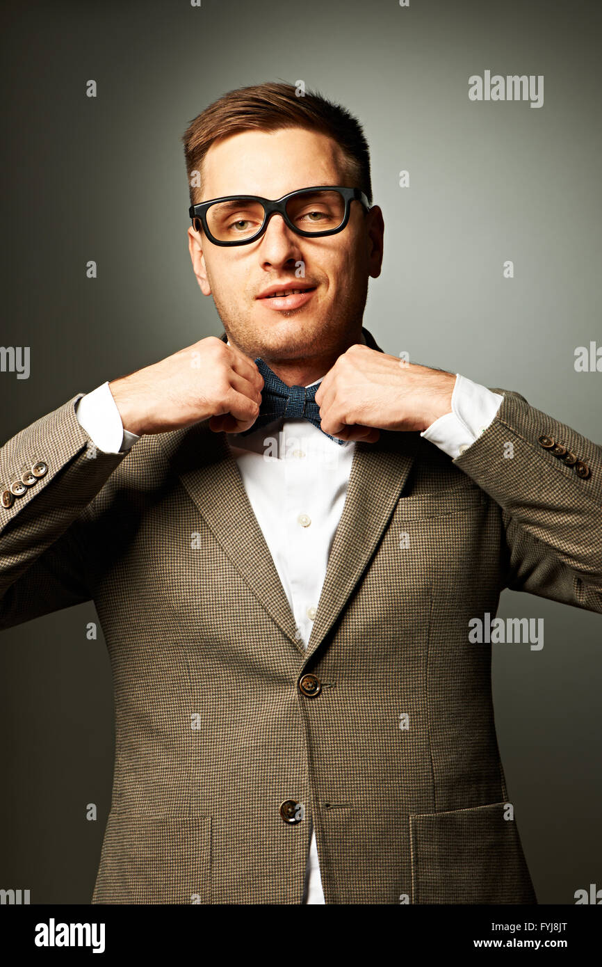 Adjust bow tie hi-res stock photography and images - Alamy