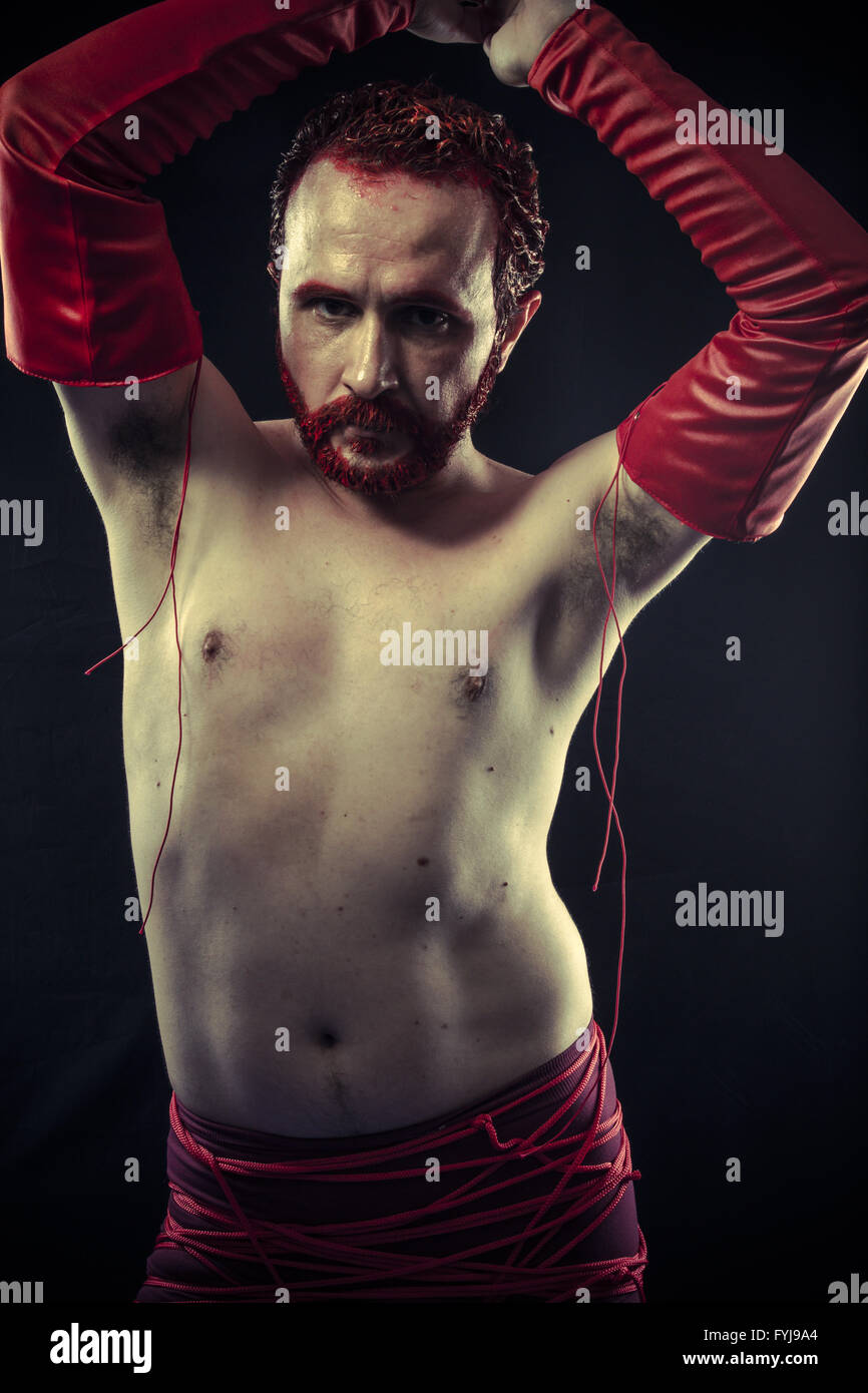 Heavy star, guitarist wearing face paint and red leather Stock Photo ...