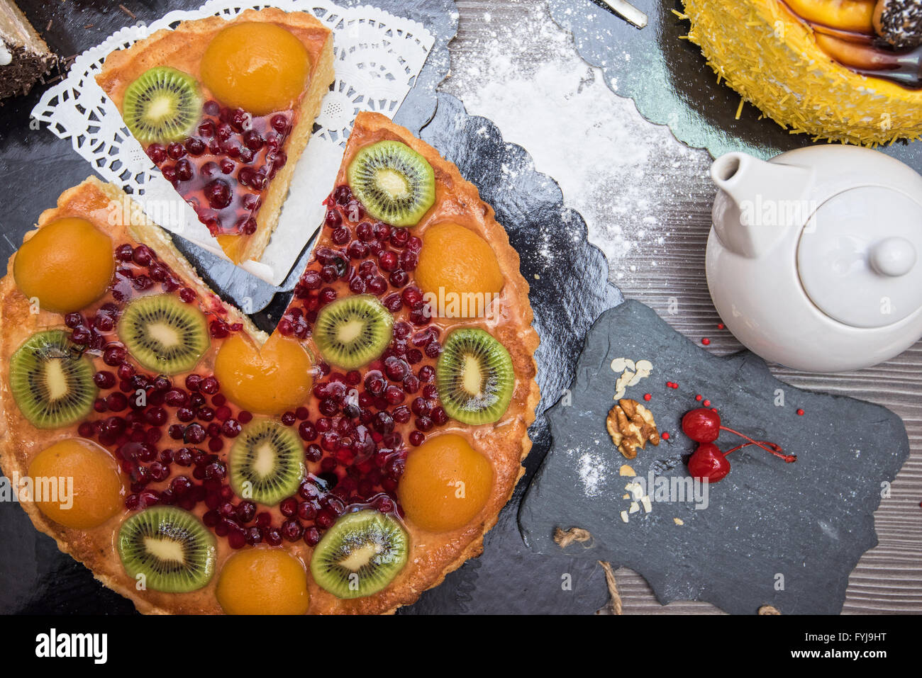 Table with fruit cakes Stock Photo - Alamy