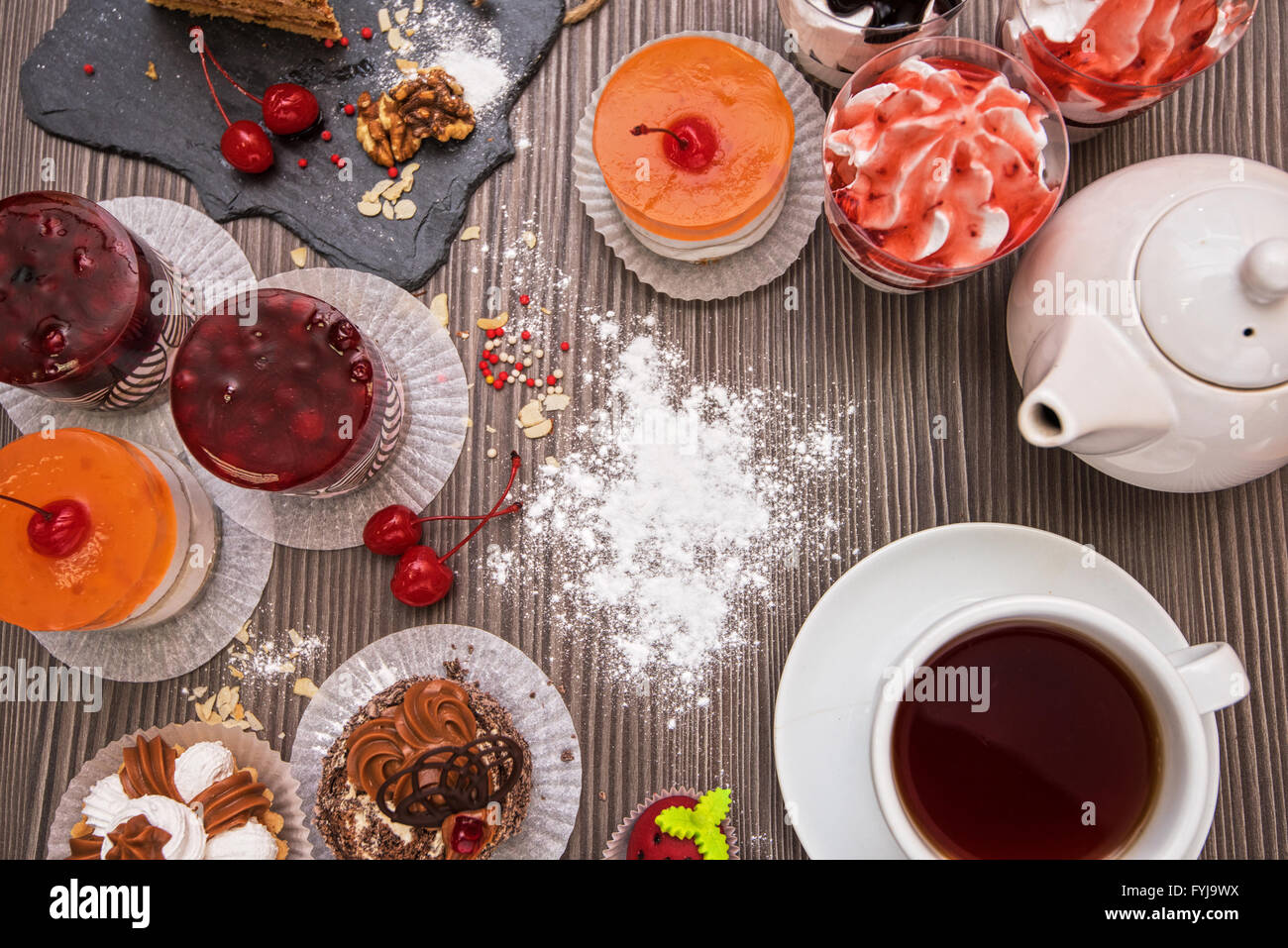 Table with fruit cakes Stock Photo - Alamy
