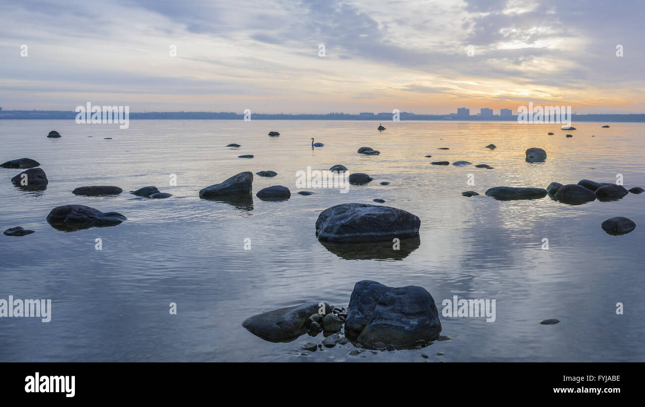 Beautiful sunrise on the sea. Views of Tallinn Stock Photo - Alamy