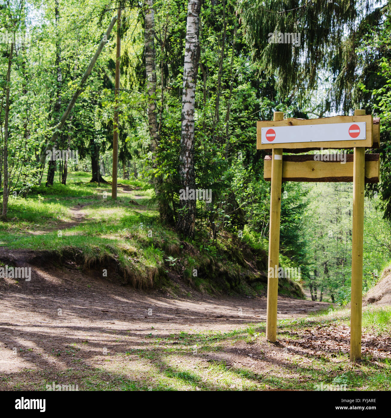Wooden sign board on the natural trail. In the forest park Stock Photo ...