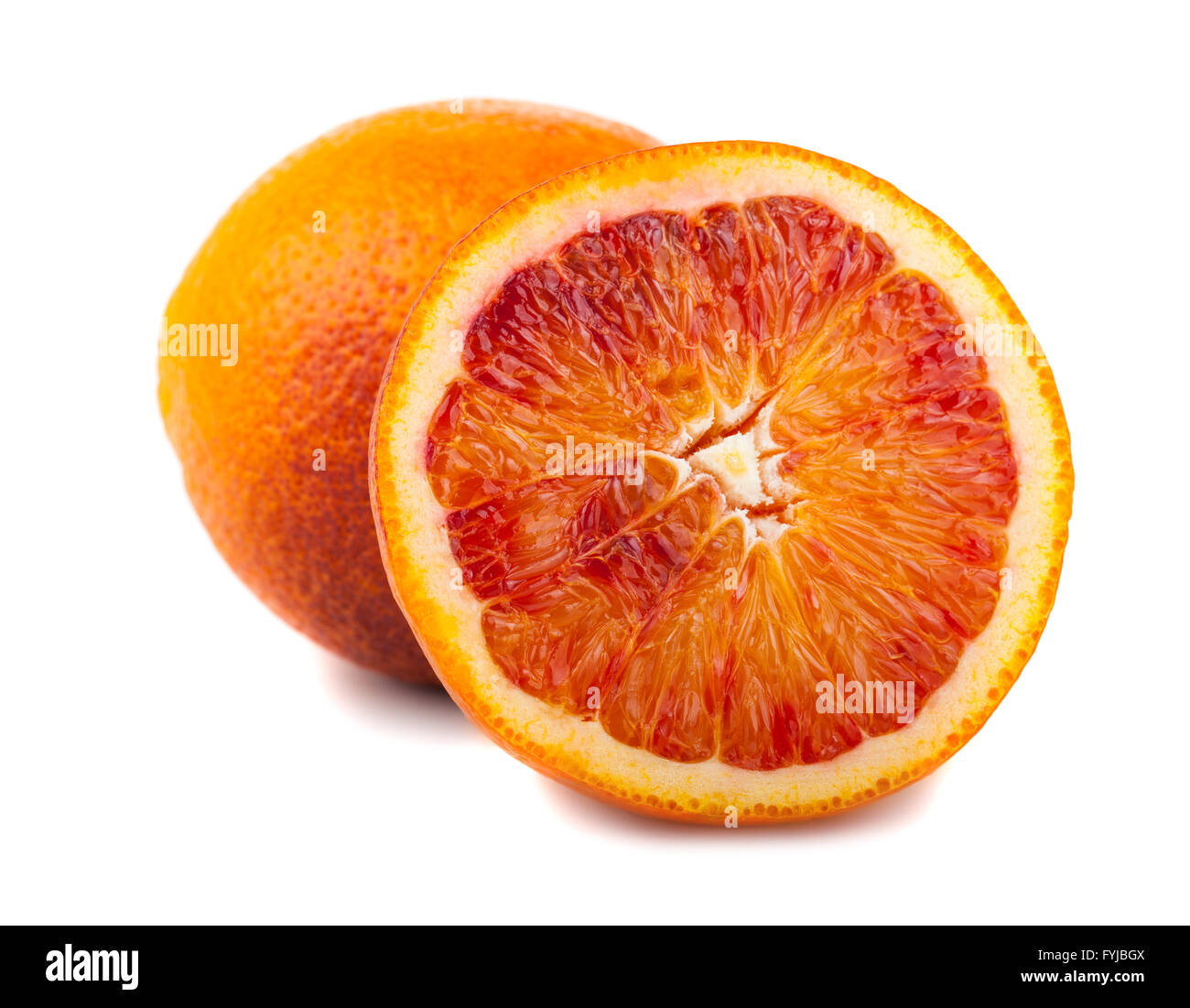 Half and full bloody red oranges Stock Photo - Alamy