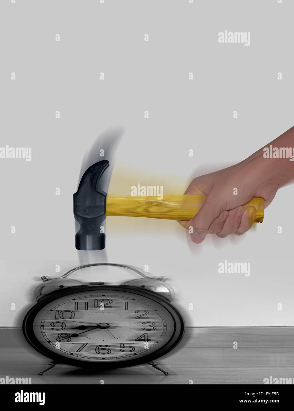 Hammer hitting Alarm Clock with motion blur Stock Photo - Alamy