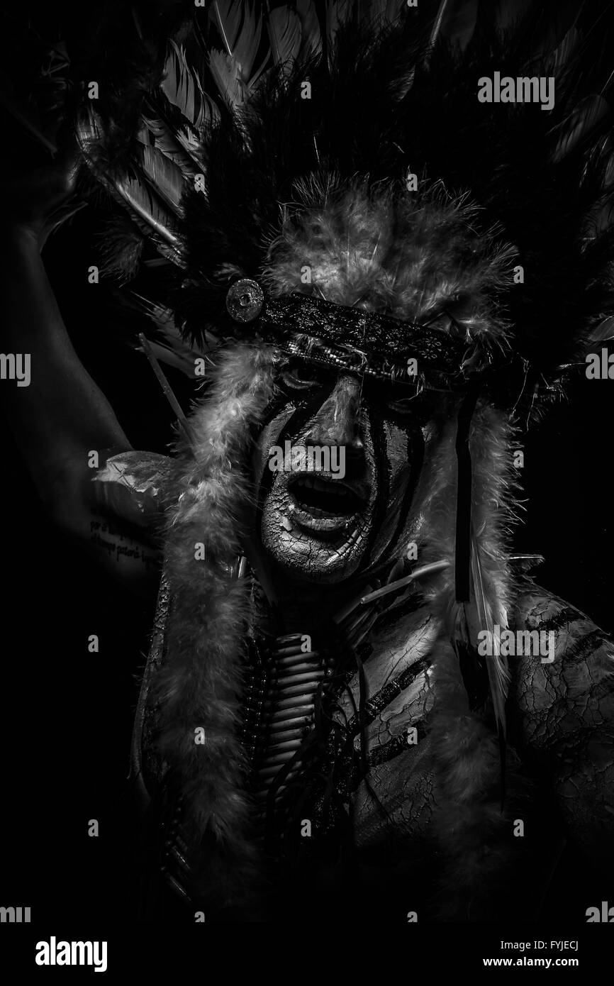 Native, American Indian chief with big feather headdress Stock Photo ...