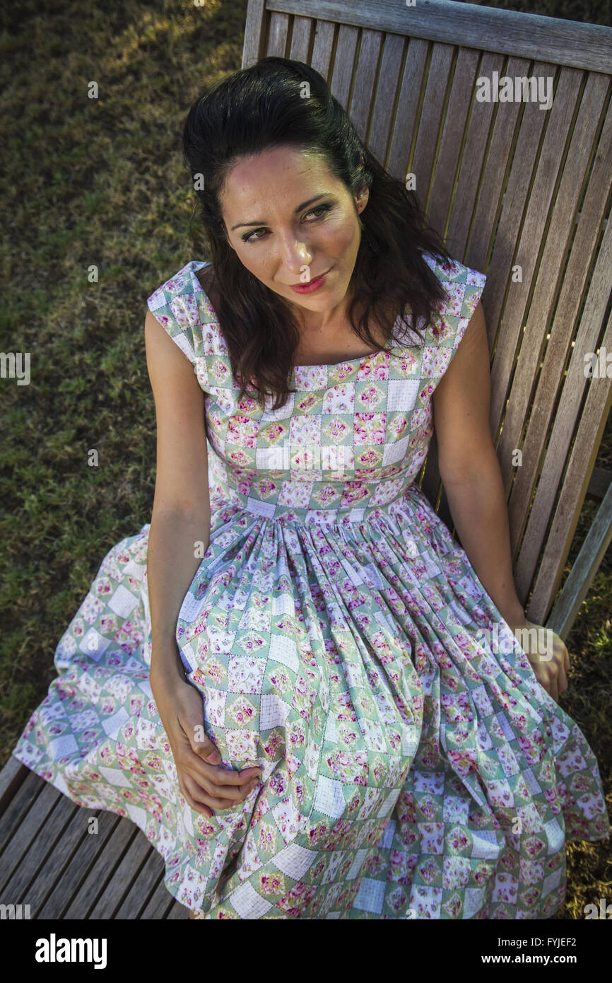 Woman gardening. Mature girl gardening in her backyard. spring season ...