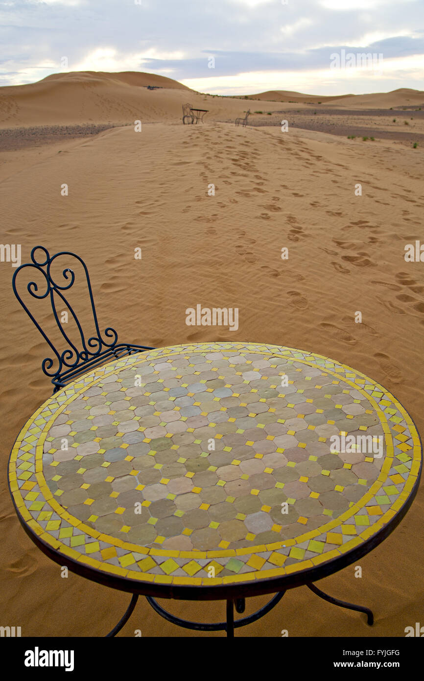table and seat in sand Stock Photo - Alamy