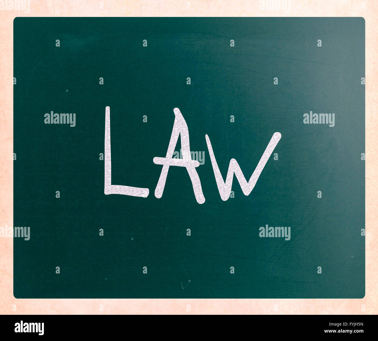The word Law handwritten with white chalk on a blackboard Stock Photo ...
