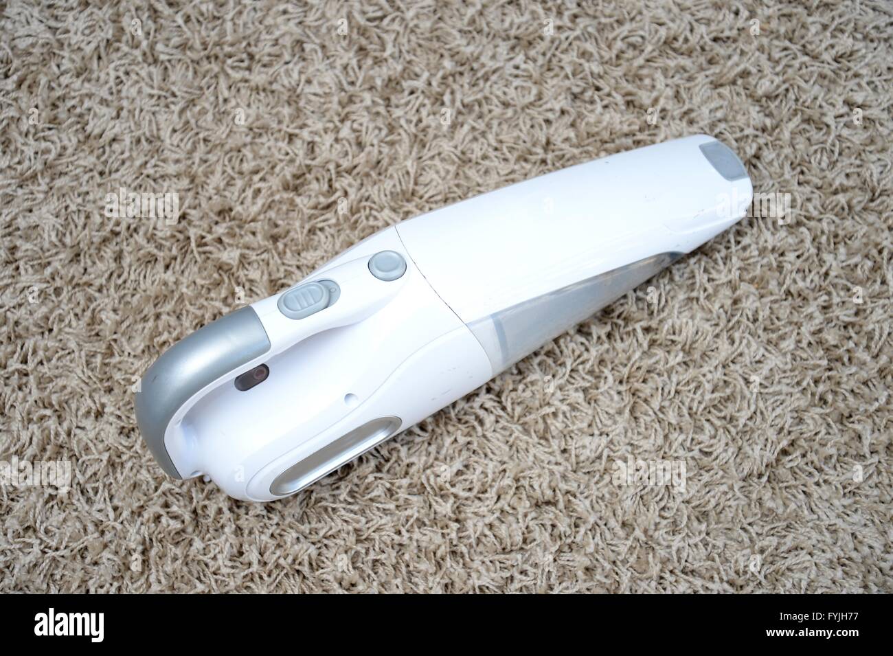 A vacuum cleaner isolated against a white background Stock Photo - Alamy