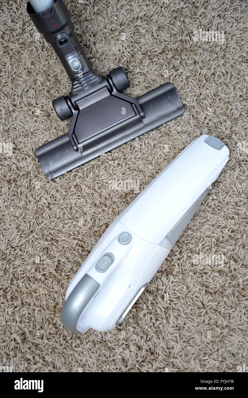 A vacuum cleaner isolated against a white background Stock Photo - Alamy