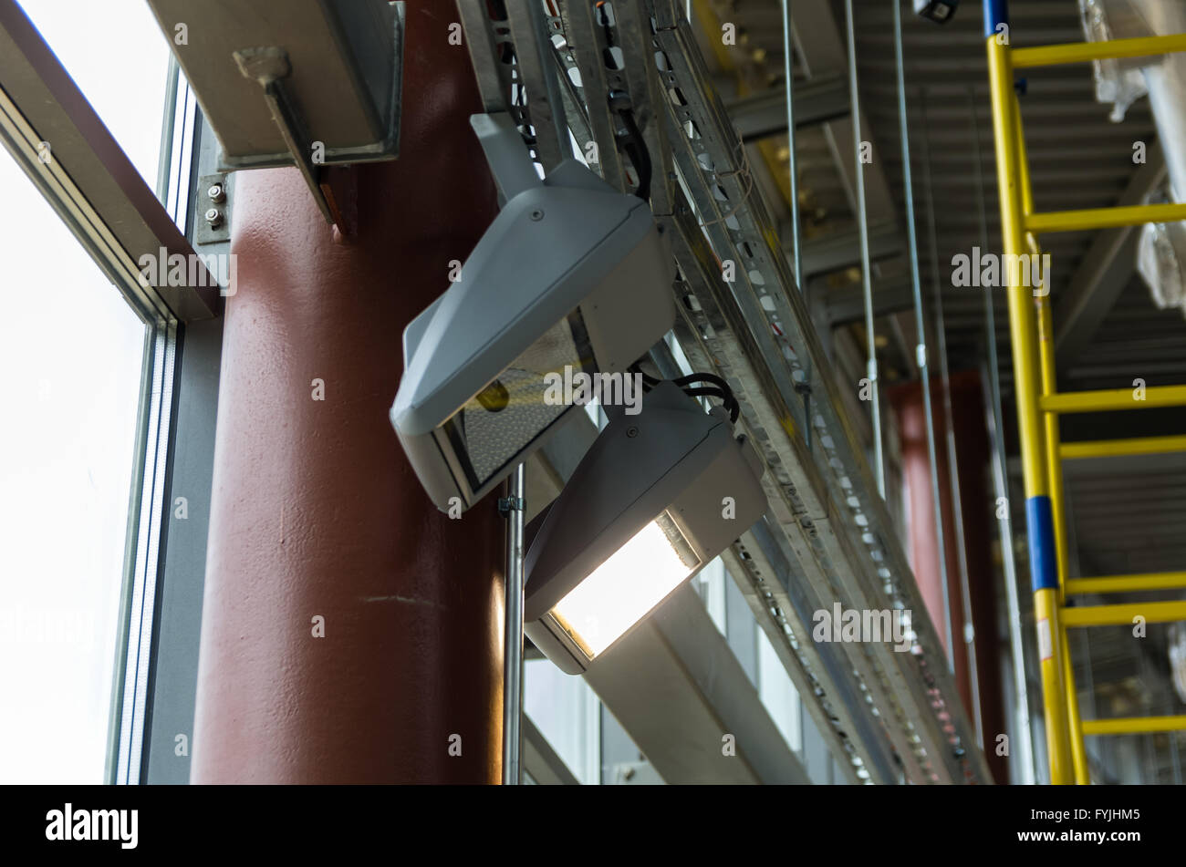 Two luminaries on cable tray Stock Photo - Alamy