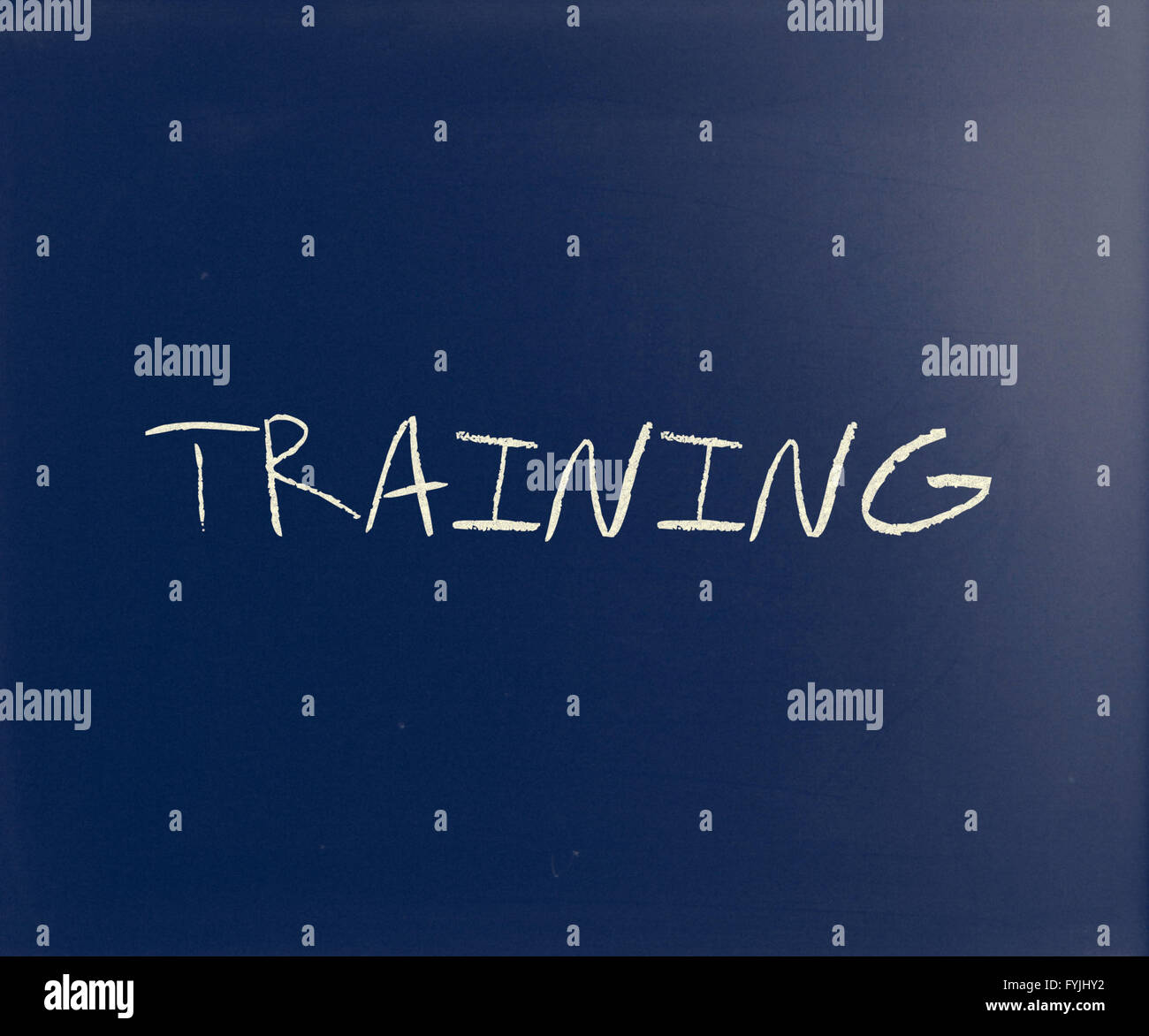 Training handwritten with white chalk on a blackboard Stock Photo - Alamy