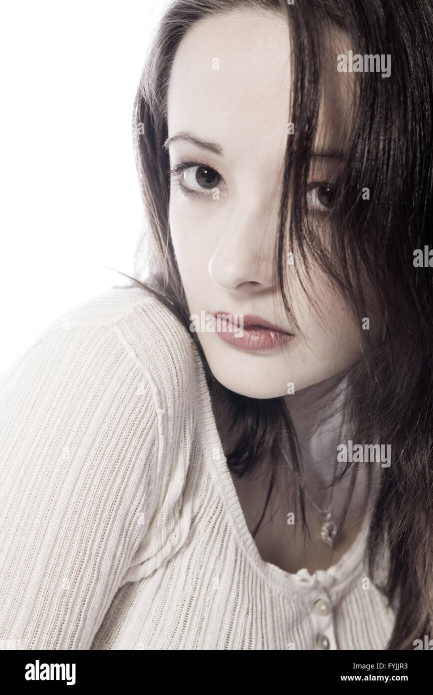 Pretty young brunette looking sturdy Stock Photo - Alamy