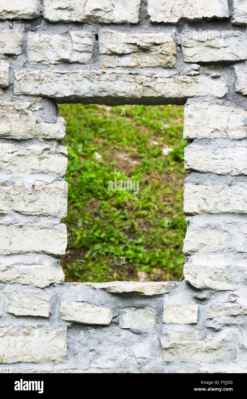 Window aperture in a wall from calcareous stones, a close up Stock ...