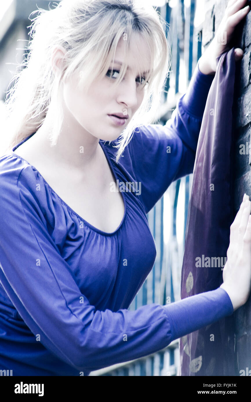 Lean against the wall Stock Photo - Alamy