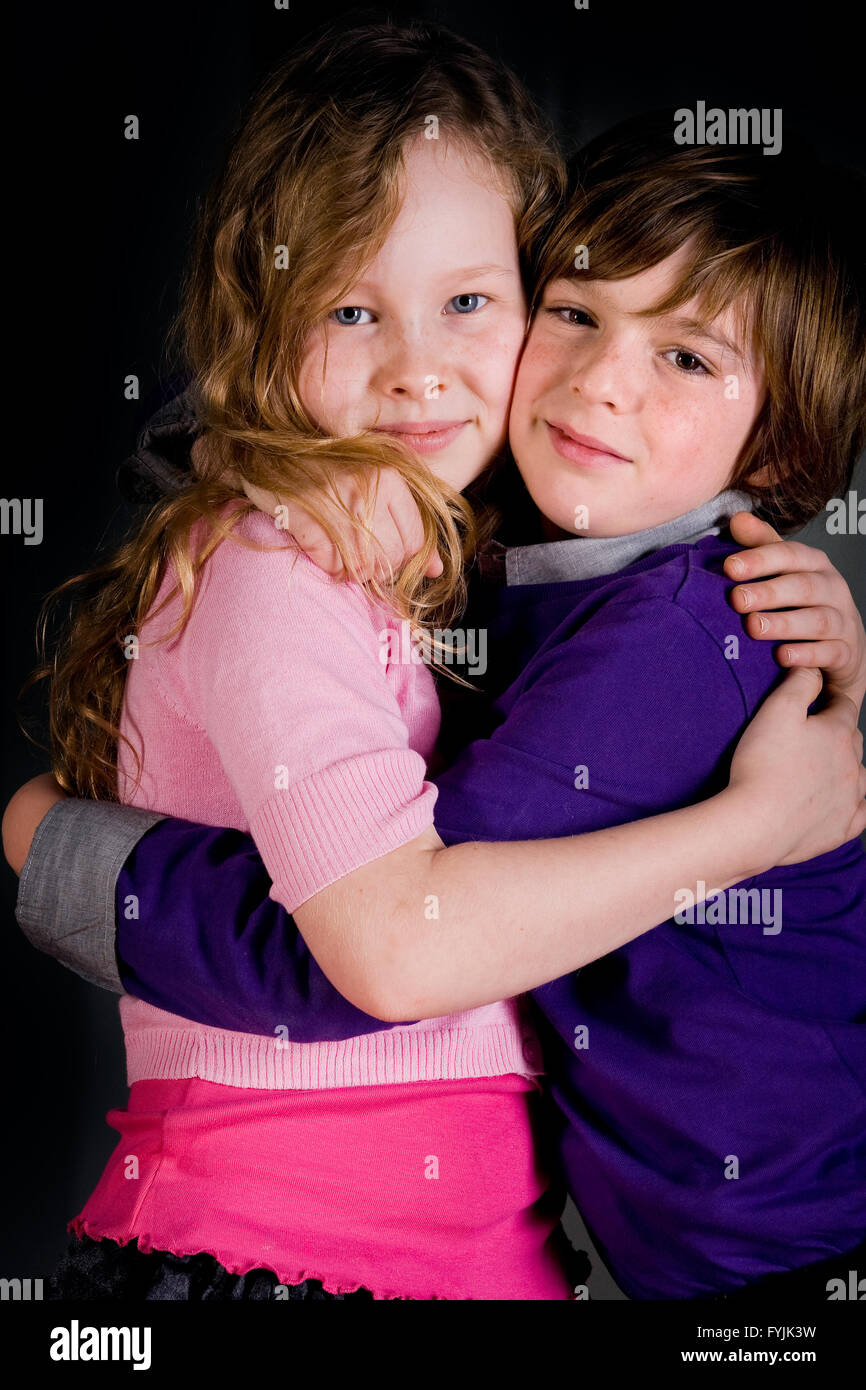 Children loving hi-res stock photography and images - Alamy