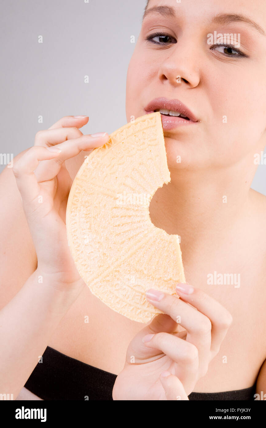 Young girl with bisquit Stock Photo - Alamy
