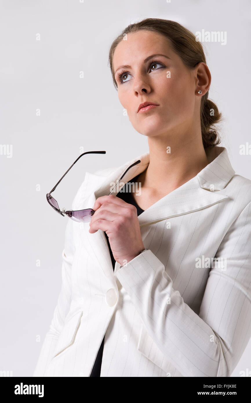 Young woman looking to interesting things Stock Photo - Alamy