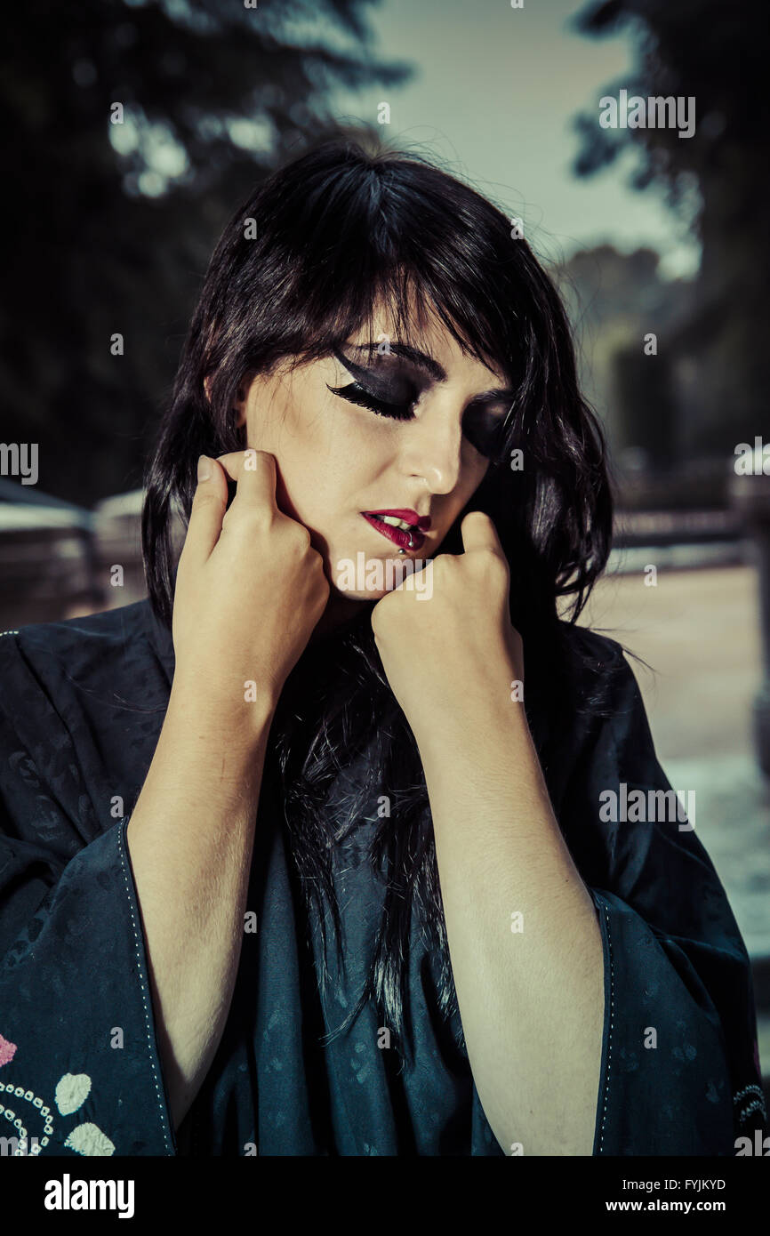 Fall, pretty young woman under autumn rain in a palace park Stock Photo ...