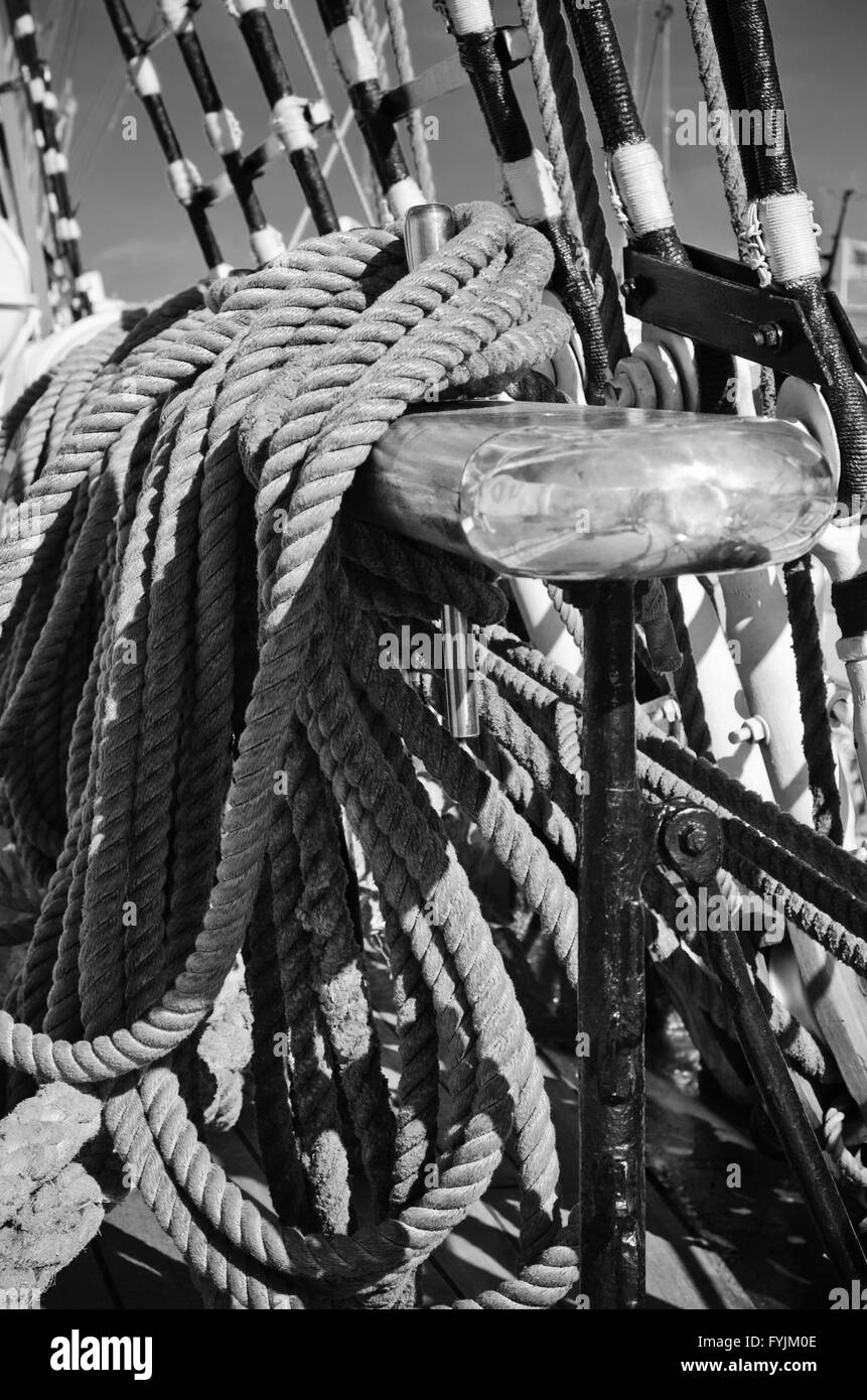 The ropes braided in bays on an ancient sailing vessel Stock Photo - Alamy