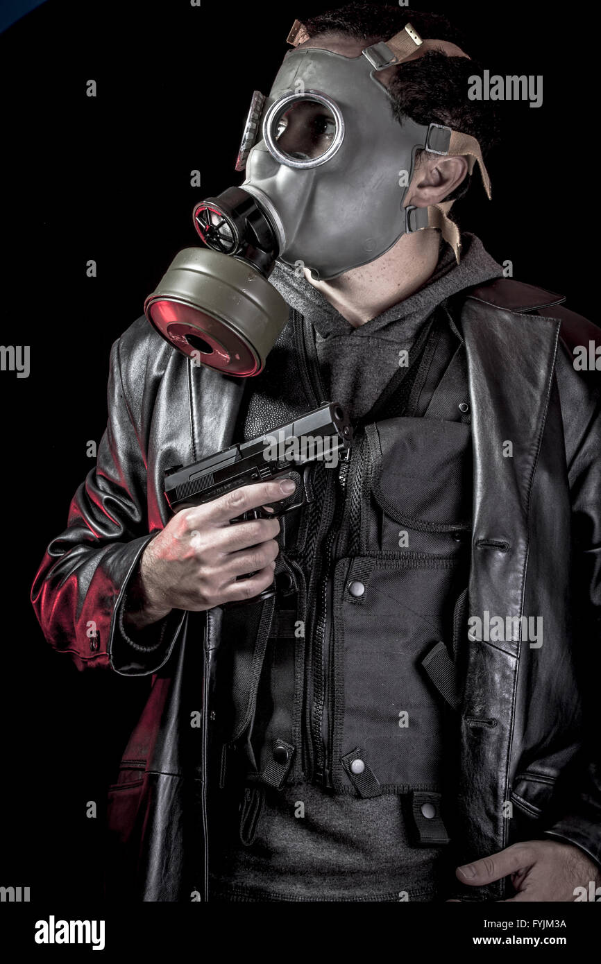 Terrorist, thief, armed man with black leather jacket, dangerous Stock ...