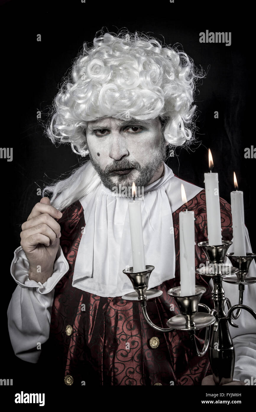 gentleman rococo era wig, chandelier with candles Stock Photo - Alamy