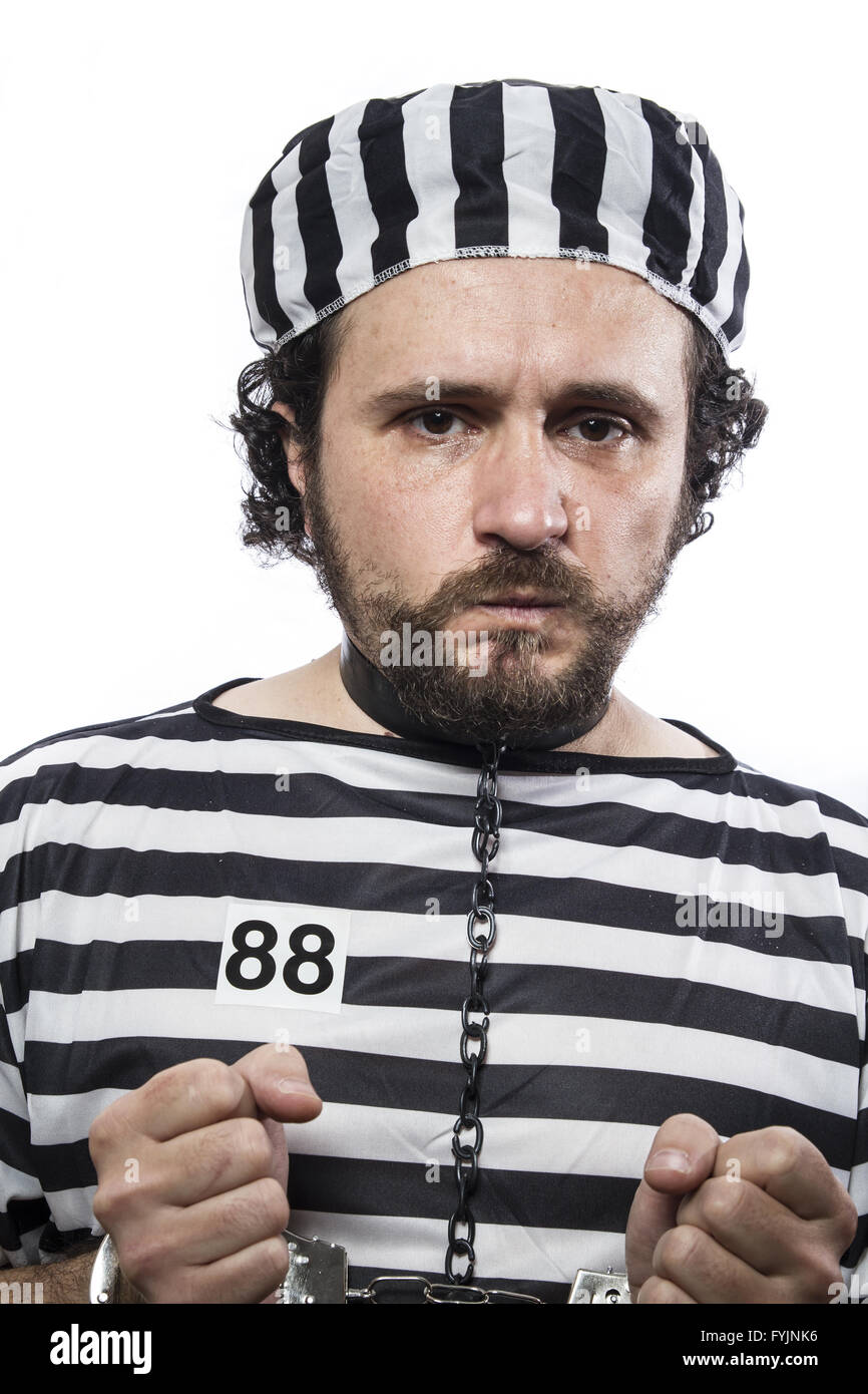 Prison key concept behind jail hi-res stock photography and images - Alamy