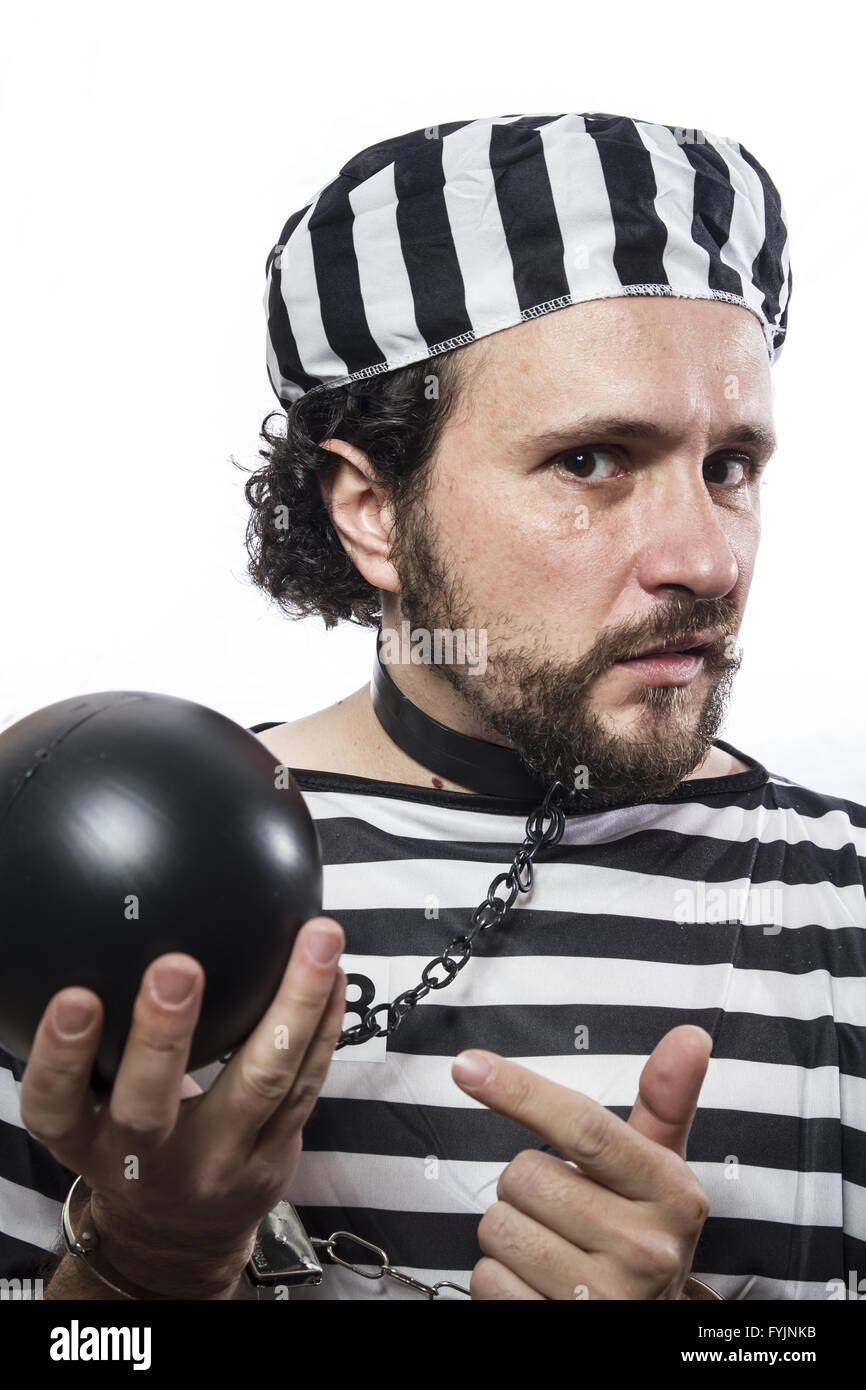 Solution, one caucasian man prisoner criminal with chain ball and ...