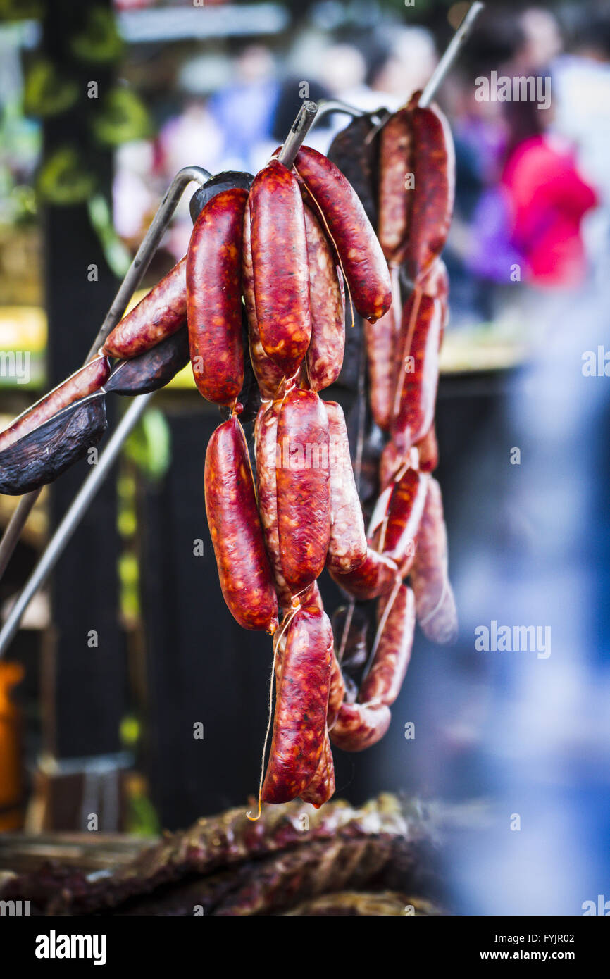 lots of sausages and chorizos in a medieval fair Stock Photo - Alamy
