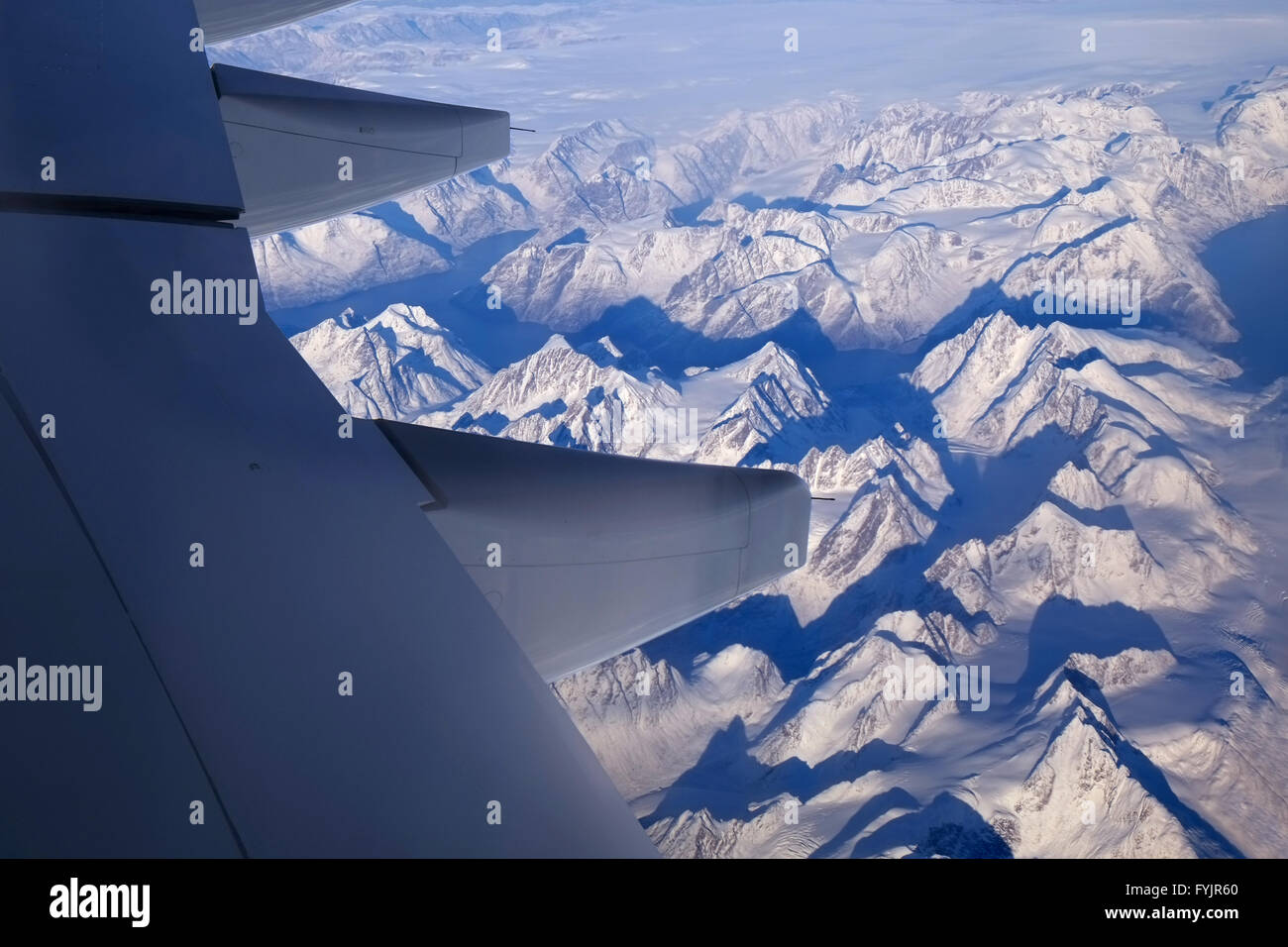 Flight over greenland Stock Photo - Alamy