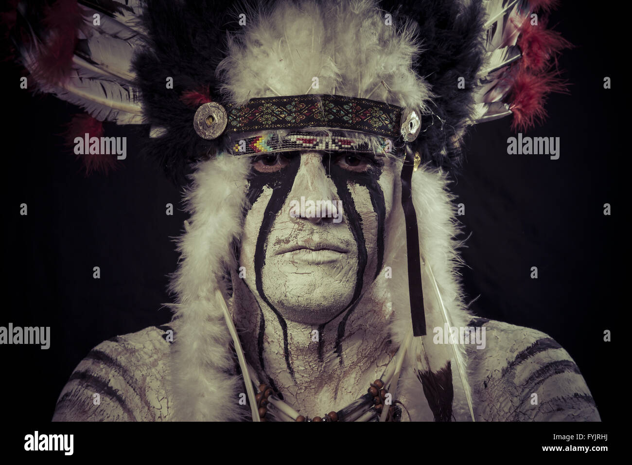 American indian chief big feather hi-res stock photography and images ...