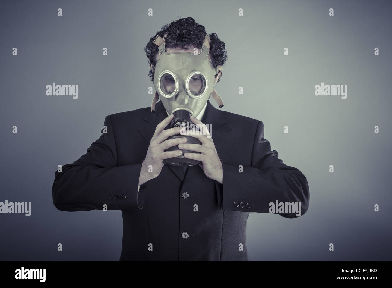 Disaster, Business man wearing a gask mask, pollution concept Stock ...