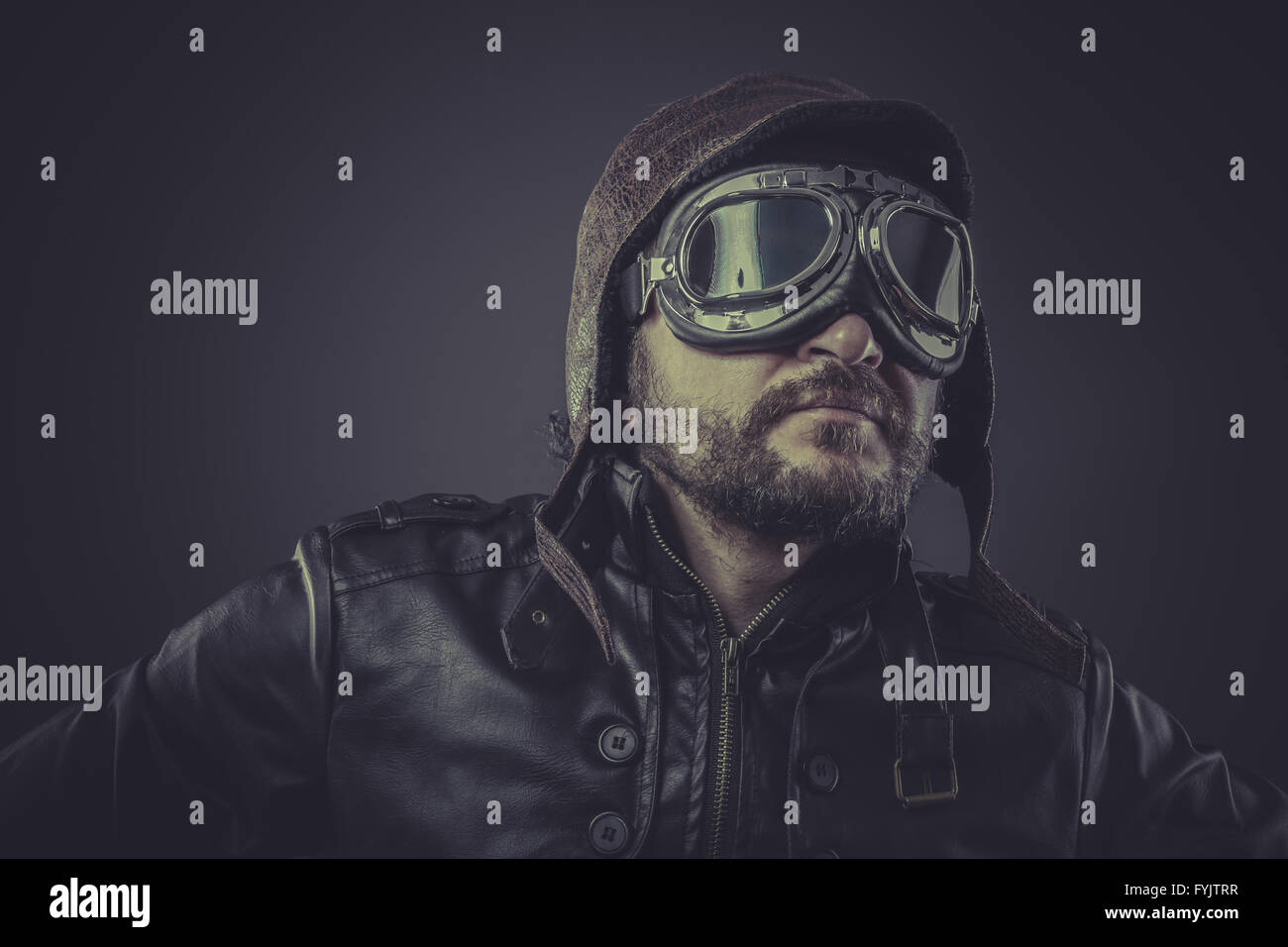 pilot dressed in vintage style leather cap and goggles Stock Photo - Alamy