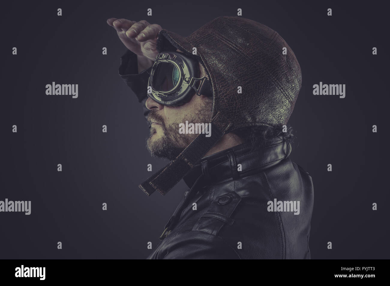 horizon, pilot dressed in vintage style leather cap and goggles Stock ...