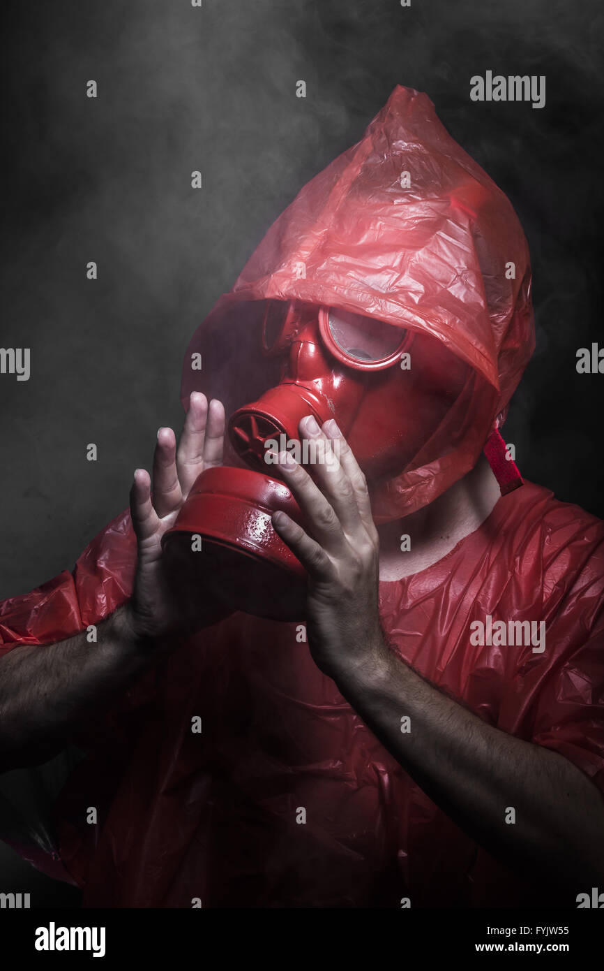 Ebola infection concept, man with red gas mask Stock Photo - Alamy