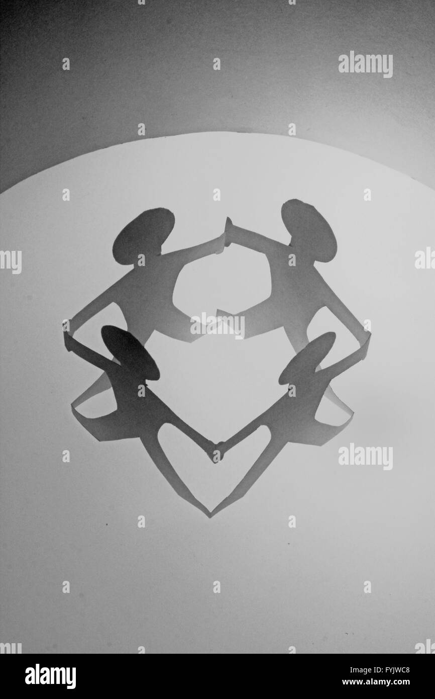 Cut out paper people Black and White Stock Photos & Images - Alamy