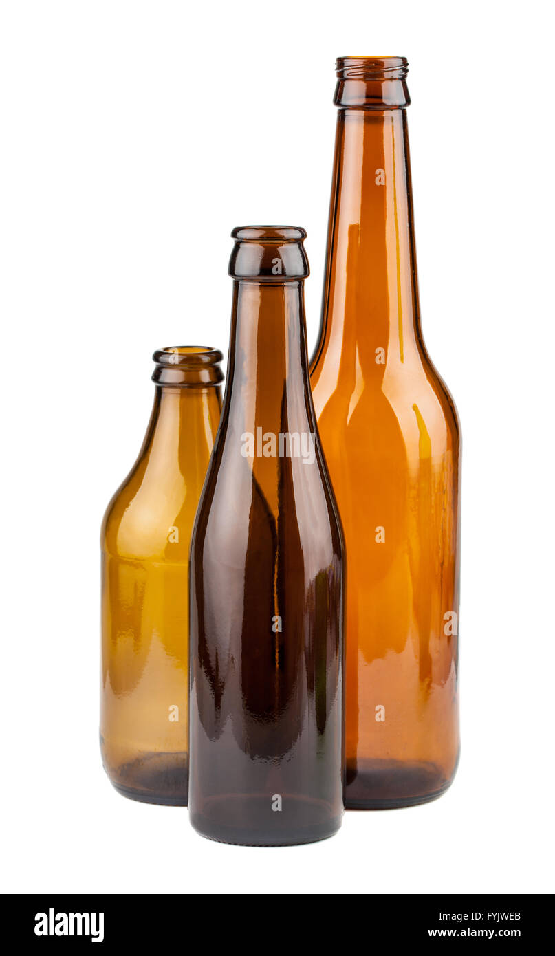Three empty brown bottles Stock Photo - Alamy