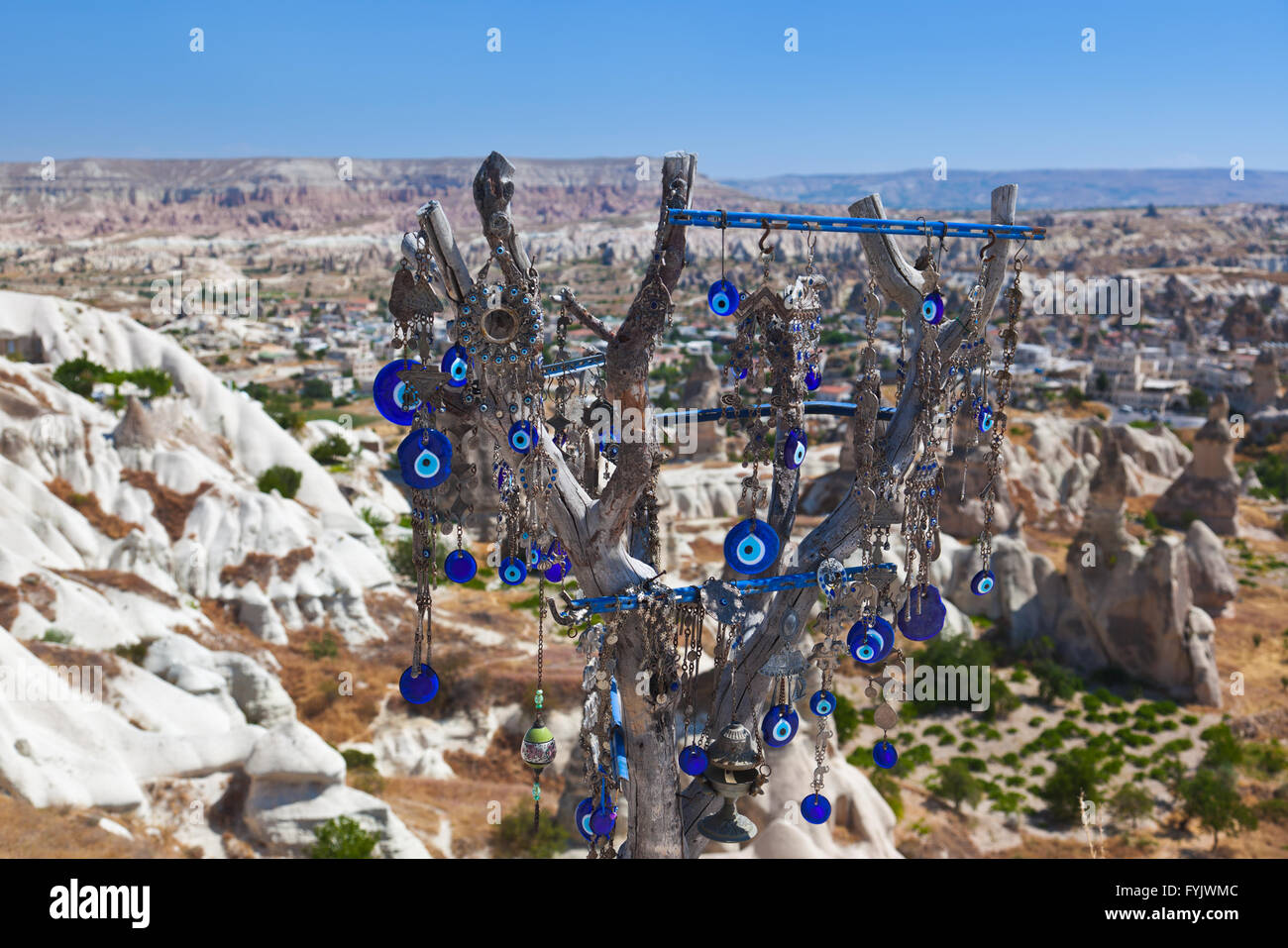 Tree and evil eye amulet in Cappadocia Turkey Stock Photo - Alamy