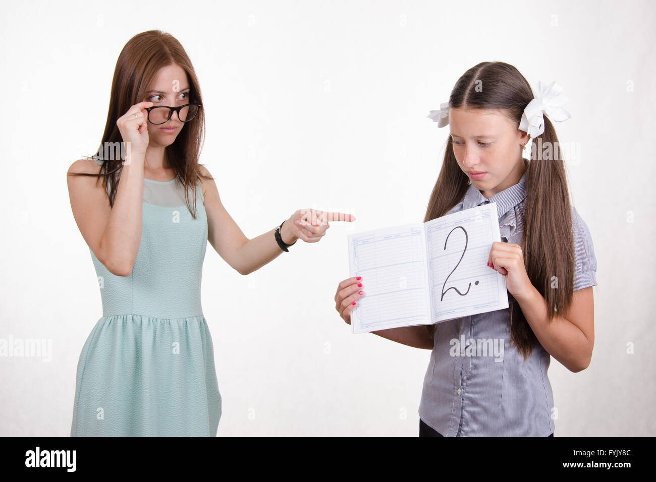 Teacher scolds the student for no lessons learned Stock Photo - Alamy