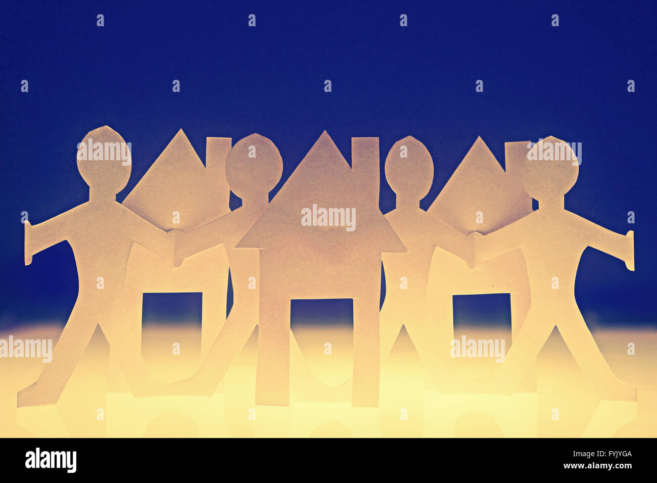 Paper Men Chain Stock Photo - Alamy