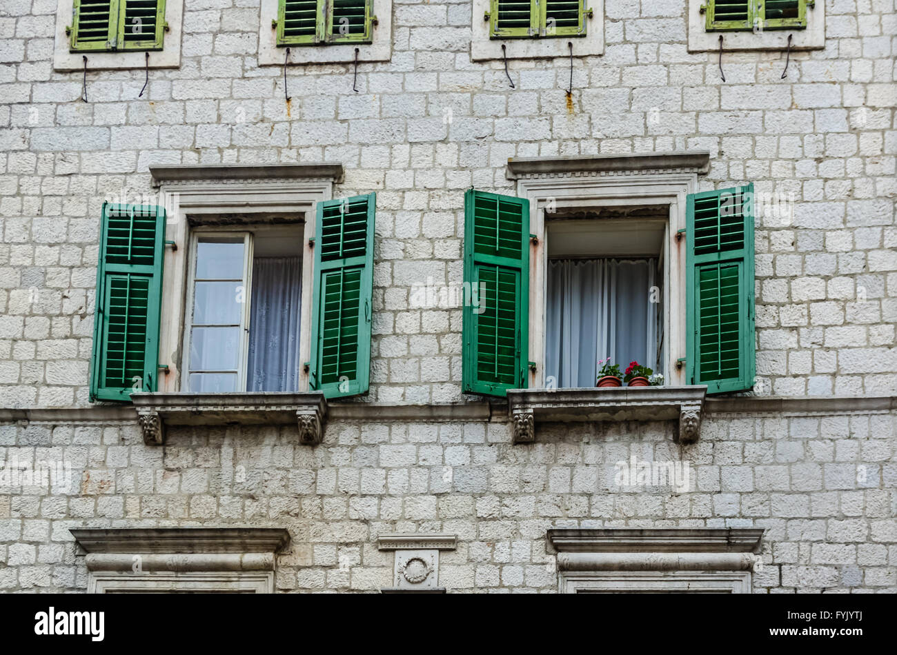 Window with louvers in old house Stock Photo - Alamy