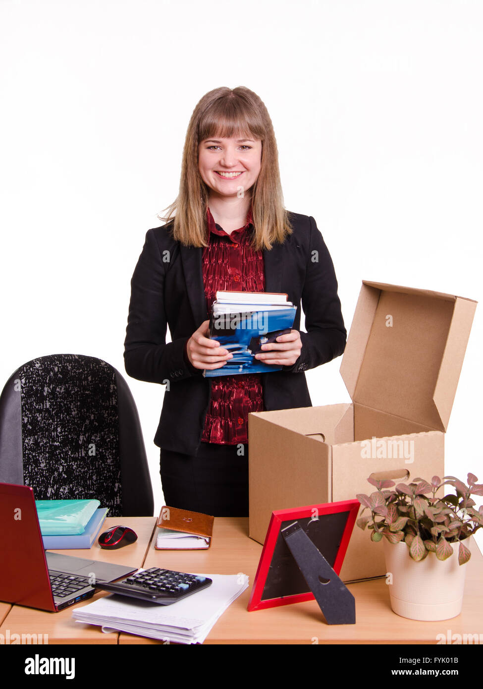 New employee in the office examines their stuff Stock Photo - Alamy