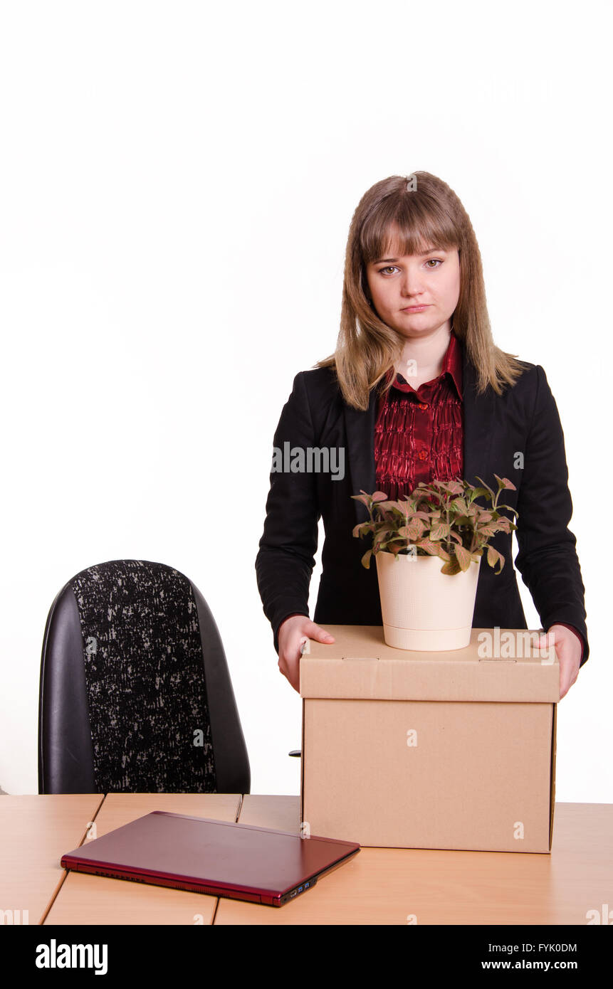 Dismissed girl in office to collect things a box Stock Photo - Alamy
