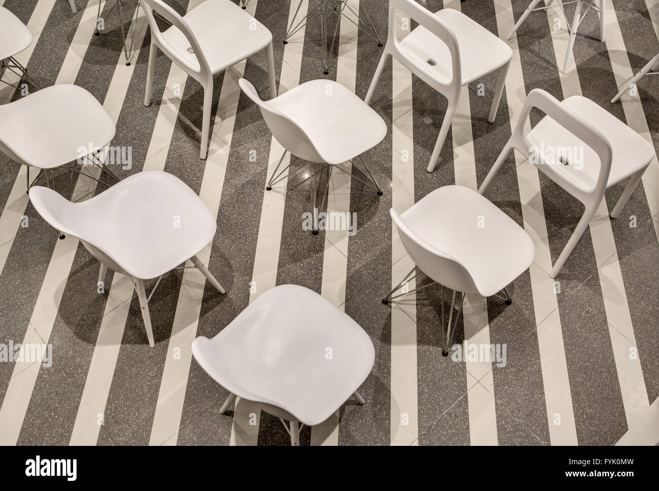 Row of plastic chairs hi-res stock photography and images - Alamy
