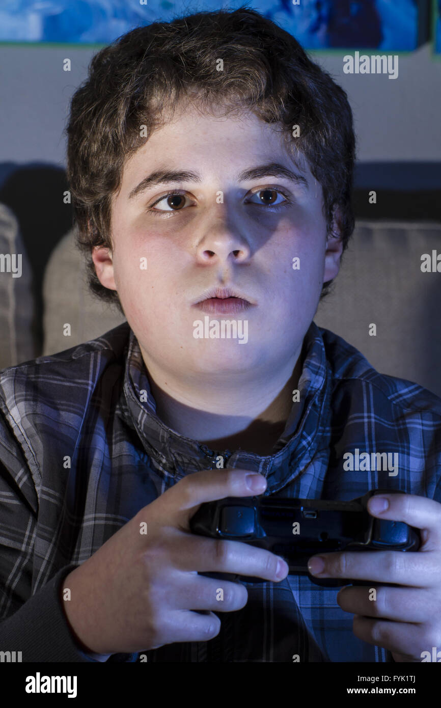 boy with joystick playing computer game at home Stock Photo - Alamy
